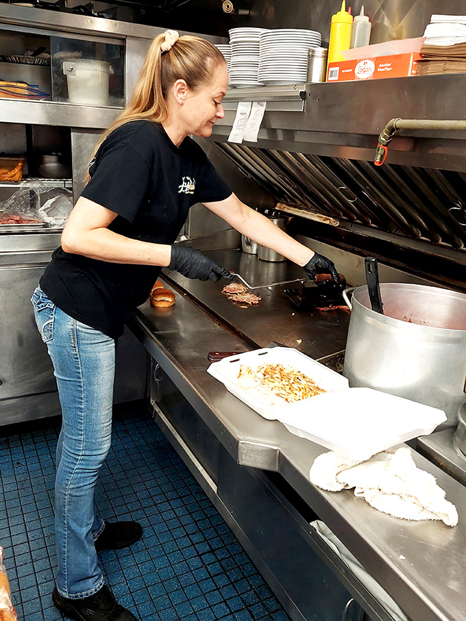 The magic happens on this well-seasoned flat-top, where cooks perform the daily ritual of turning simple ingredients into memories.