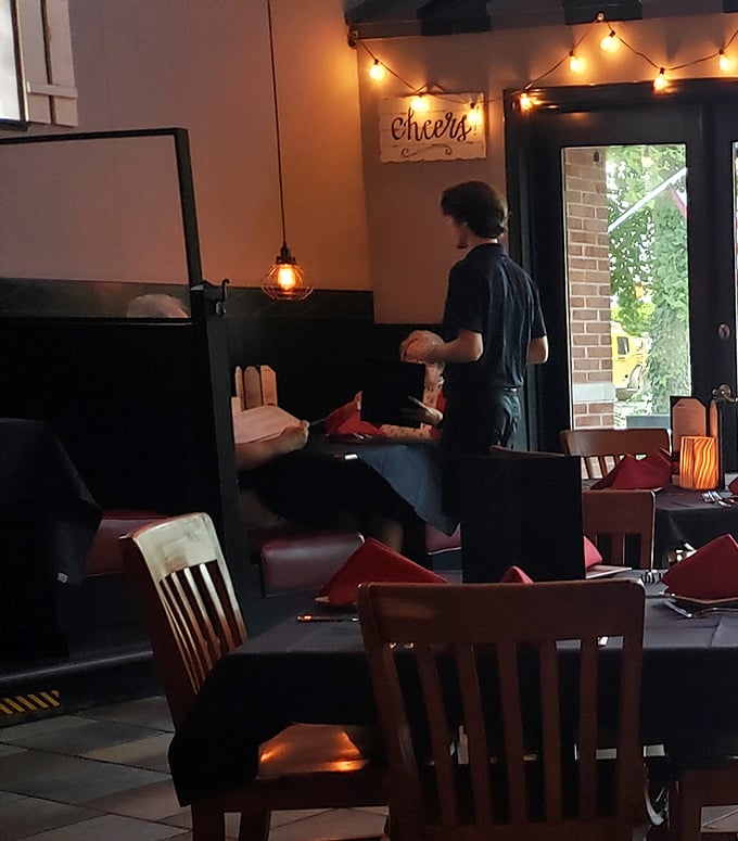 Where hospitality meets efficiency. In the soft glow of string lights, your seafood journey's friendly guide awaits.