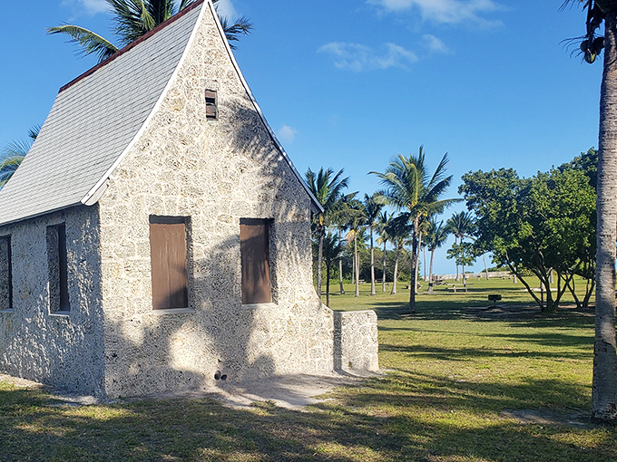 This coral rock structure has weathered hurricanes and history, its sturdy walls a testament to craftsmanship from an era before power tools.
