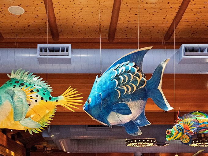 Colorful fish sculptures dangle from the ceiling, silently judging your decision not to order seafood. They know what you're missing.
