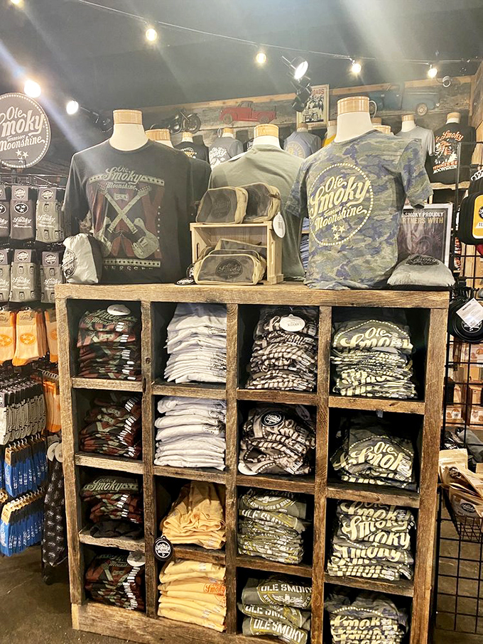 Moonshine fashion has come a long way from prohibition-era overalls. The gift shop's apparel section lets you wear your mountain spirit on your sleeve—literally.