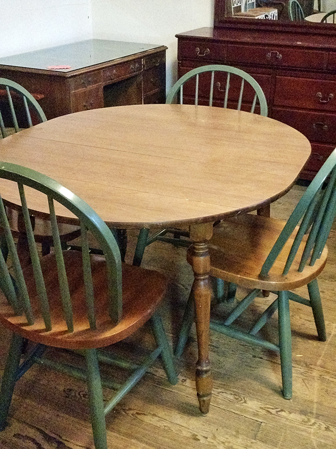 A dining set with character that whispers "Sunday family dinners" and "late-night heart-to-hearts"&mdash;the mint-green chairs adding a splash of personality no catalog furniture could match.