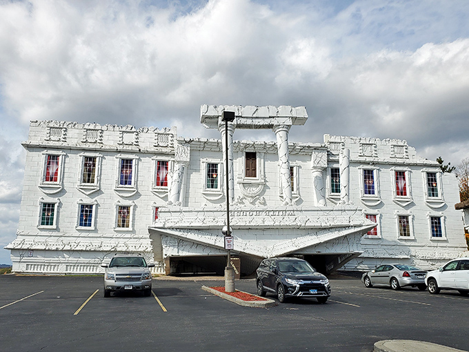 The imposing white structure could be mistaken for a misplaced Greek temple or the world's most ambitious wedding cake gone architectural.