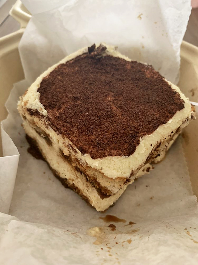 Tiramisu so perfectly executed, it makes you wonder if there's an Italian dessert wizard hiding in the kitchen dusting cocoa with magical precision.