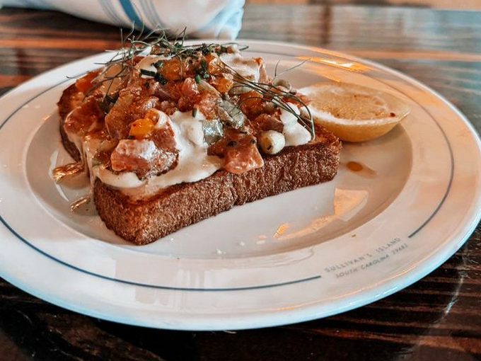Not your average toast&mdash;this seafood-topped creation transforms humble bread into a canvas for culinary artistry that's almost too pretty to eat. Almost.