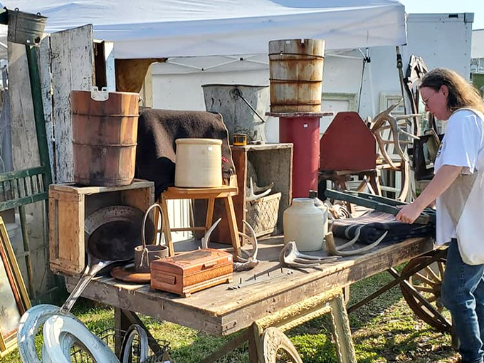 Rural Americana displayed on a weathered farm wagon. These primitive tools and crockery survived decades of use before finding their way to Elkhorn.