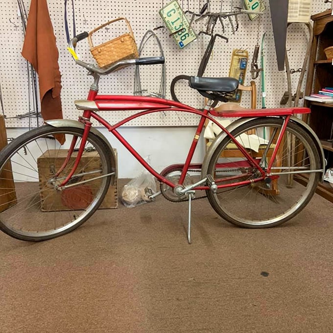A classic red bicycle that probably carried countless childhood adventures, now ready to create new memories for generations.