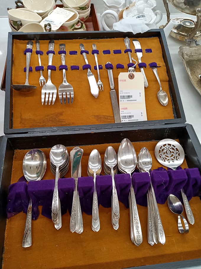 Silver-plated elegance nestled in purple velvet—these forks and spoons have stories to tell of dinner parties past and brunches future.