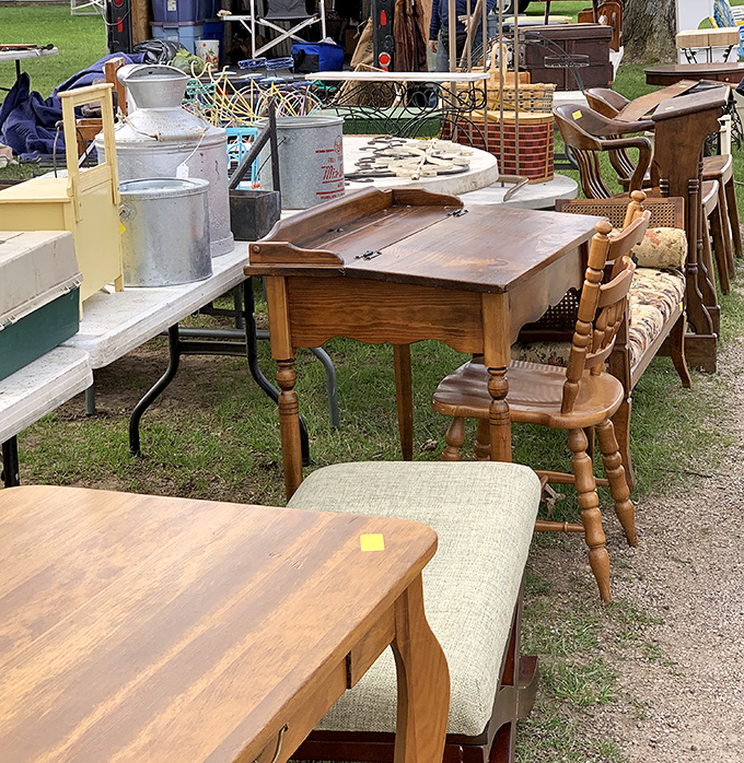 Mid-century furniture awaits its forever home. That kitchen table has probably hosted everything from Sunday pot roasts to heated Monopoly battles.