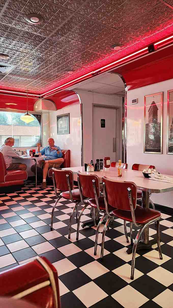 Another angle reveals the cozy atmosphere where strangers become friends over coffee refills.