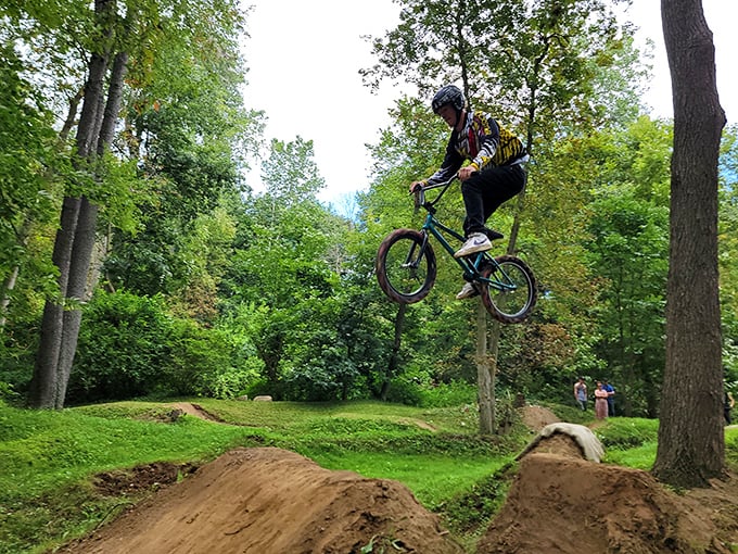 A daring cyclist catches air at Apple Creek's bike park, proving that thrills aren't exclusive to the English (non-Amish) world.