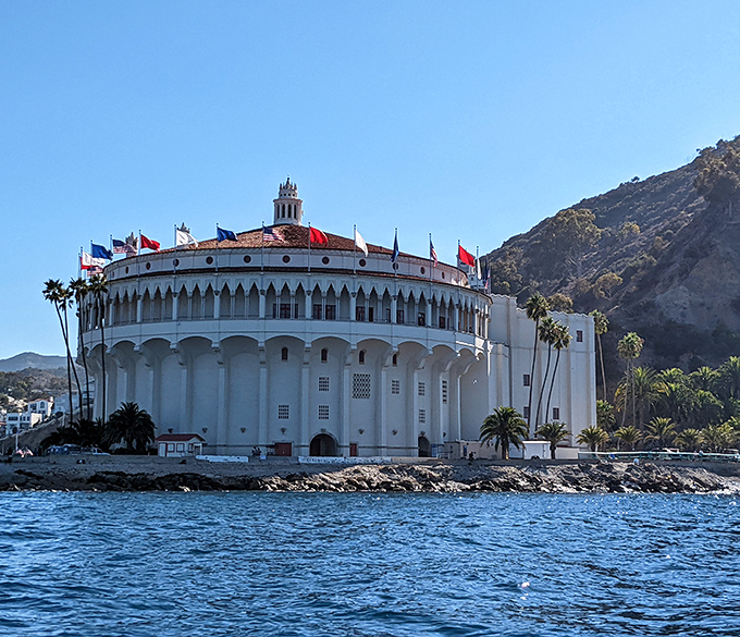 Avalon's iconic Casino building rises majestically from the shoreline, its circular Art Deco design a landmark of Catalina Island.