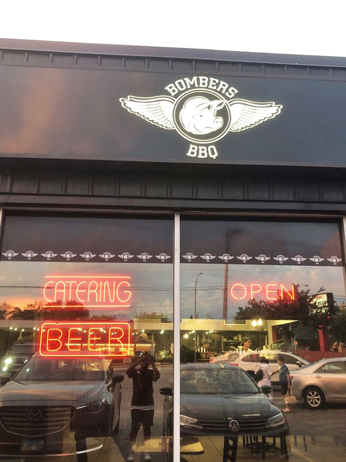 When neon signs promise "BEER" and "CATERING," you know you've found a place that understands BBQ's true companions.