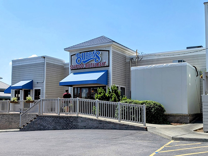 Bubba's clean white exterior with blue awnings looks like it was plucked from a coastal postcard &ndash; seafood with a view.