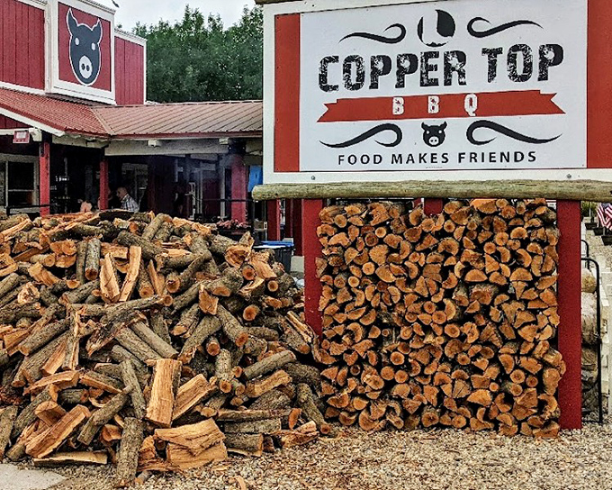 Copper Top's rustic red barn and woodpile tell you everything you need to know. Serious smoke happens here.