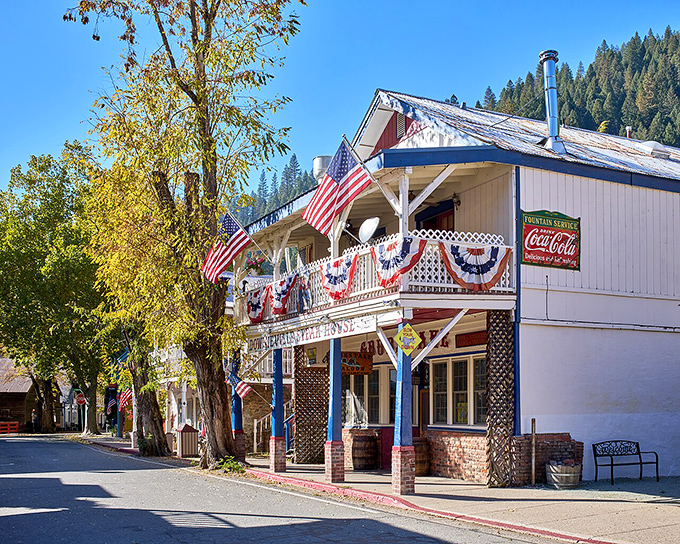 Downieville's patriotic bunting and vintage Coca-Cola signs create pure Americana magic in the mountains.