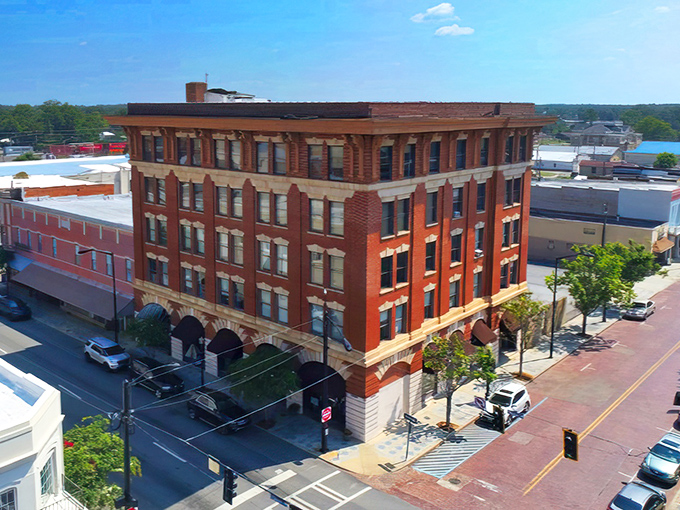 Fitzgerald's downtown rises like a red brick testament to affordable living, where your Social Security check feels suddenly more substantial.