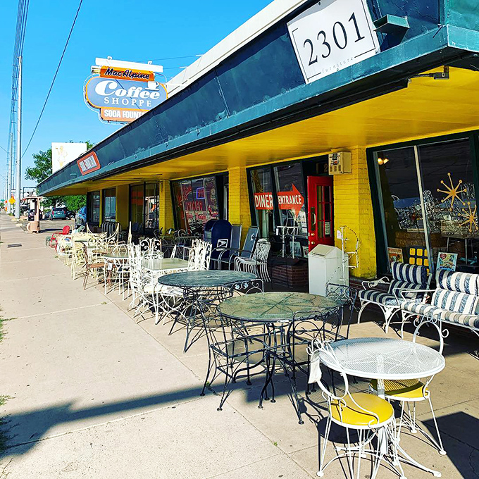 MacAlpine's vibrant yellow exterior and vintage patio furniture set the stage for ice cream treats that taste like childhood memories.