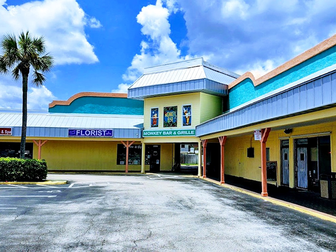 The Monkey Bar's bright yellow storefront promises the kind of night that creates stories you'll tell for years.