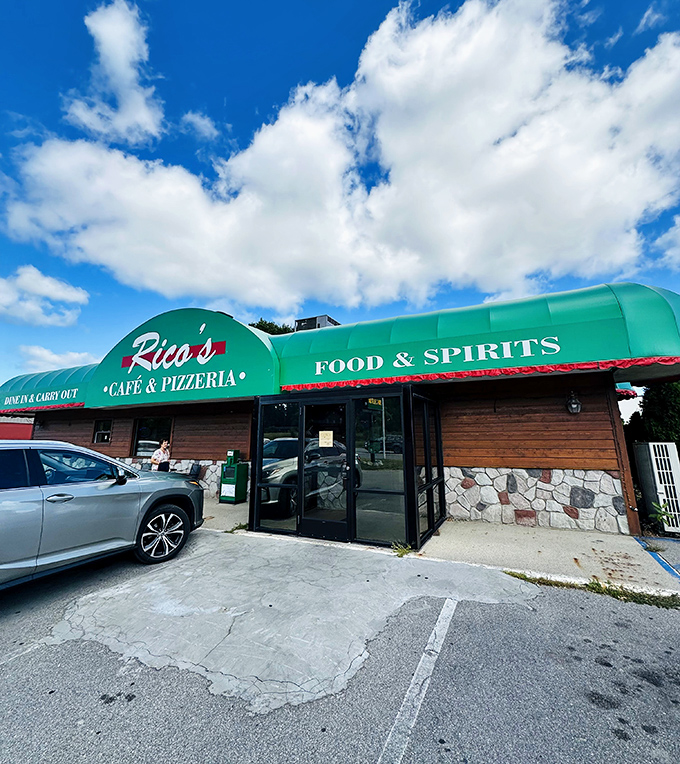 Rico's distinctive green awning is like a pizza oasis in Grawn. That stone and wood exterior hints at the rustic goodness inside.
