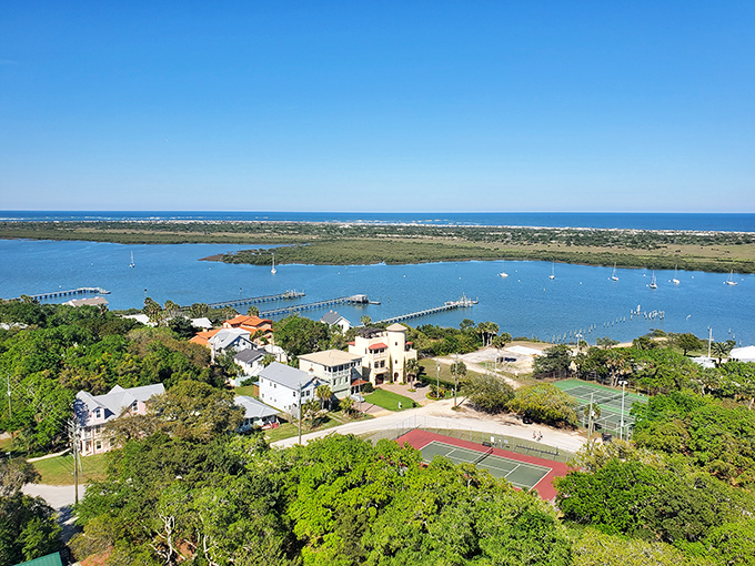 St. Augustine's aerial view reveals nature's perfect harbor, where boats rest like toys in crystal-clear waters.