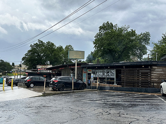 Stanley's weathered exterior hints at the authentic BBQ experience waiting inside. Like a well-used smoker, the patina tells a story.
