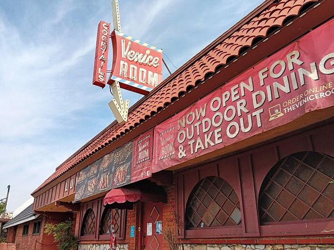 That classic red tile roof and vintage signage transport you to steakhouse golden age - where quality beef never goes out of style.