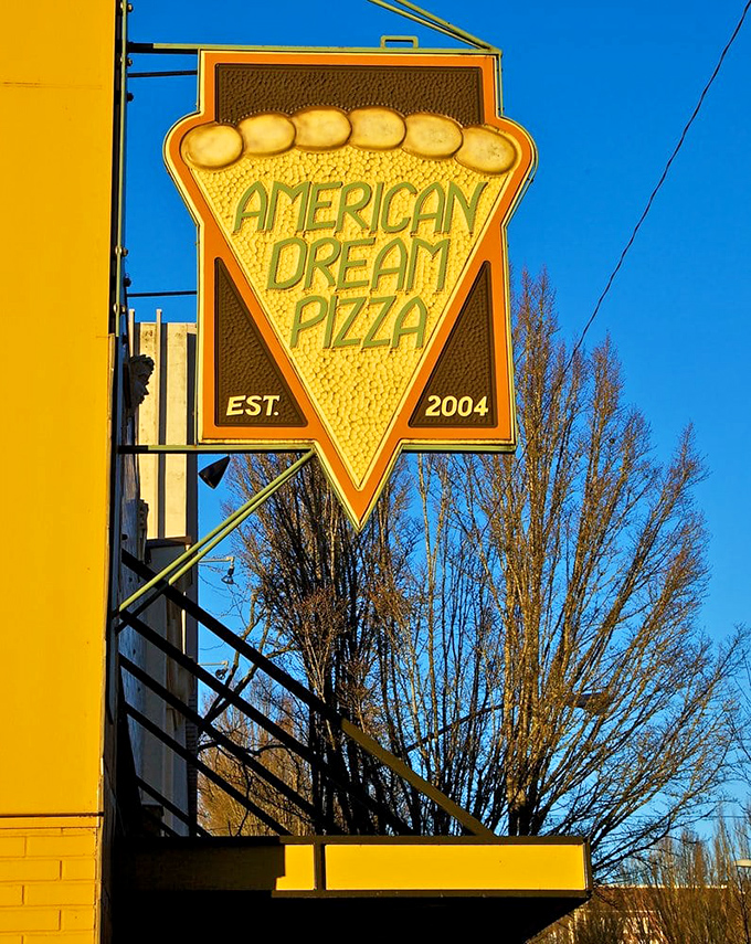 The sign says it all&mdash;a perfect triangle of cheesy goodness that's been fulfilling Corvallis dreams since 2004.