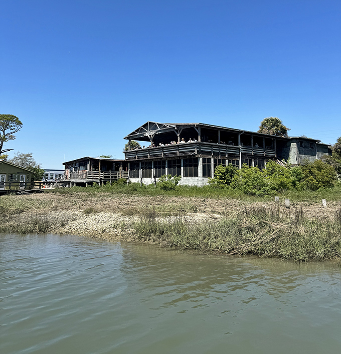 Those stilts aren't just for show; they're holding up a piece of culinary history that serves pizza worth the journey.