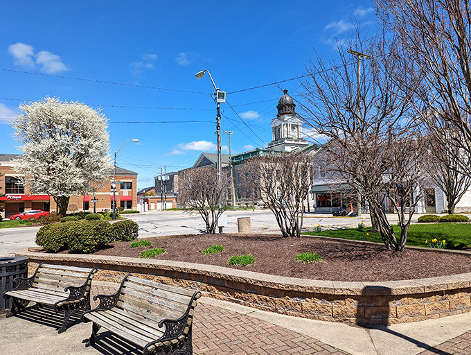 Spring blossoms frame Bucyrus' town center&mdash;where park benches invite you to sit a spell and watch small-town life unfold at its own pace.
