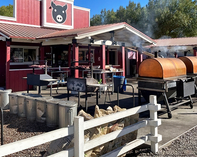 Mountains of firewood feed the flames at Copper Top BBQ. Each log a future flavor in your pulled pork.