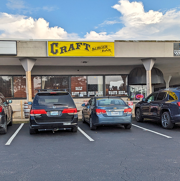 Even in daylight, Craft Burger Bar's sign stands out against the blue sky. A sunny promise of burger perfection awaits inside.