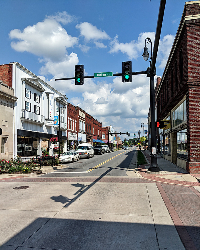 Union Street's green lights seem to say 'proceed directly to charm' in downtown Erwin, where the historic buildings stand like patient grandparents watching modern life hurry by.