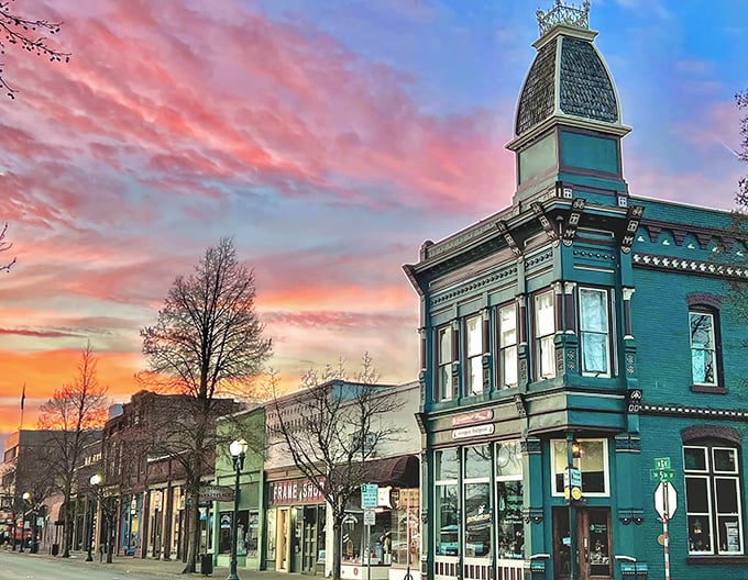Sunset paints Grants Pass's historic buildings in golden hues, matching the golden opportunity for affordable living.