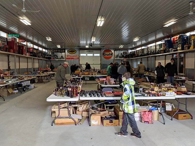 Vintage signs and automotive treasures! This outdoor display at Jake's Flea Market features nostalgic advertising that takes you back in time.