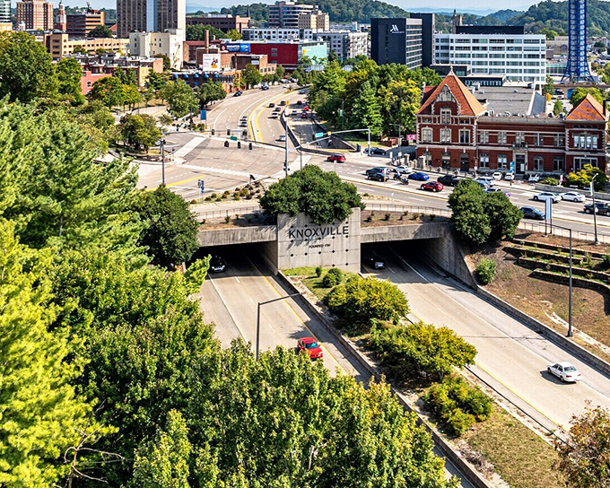 Knoxville's cityscape unfolds beneath you, where historic architecture meets modern design in Tennessee's third-largest city.