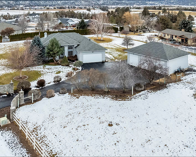 The snow-dusted hills surrounding Prineville create a winter wonderland where retirement dollars stretch as far as the high desert views.