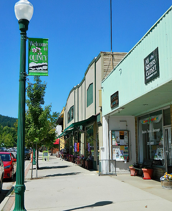 The "Welcome to Quincy" sign promises small-town charm, and the tree-lined main street more than delivers on that promise. 