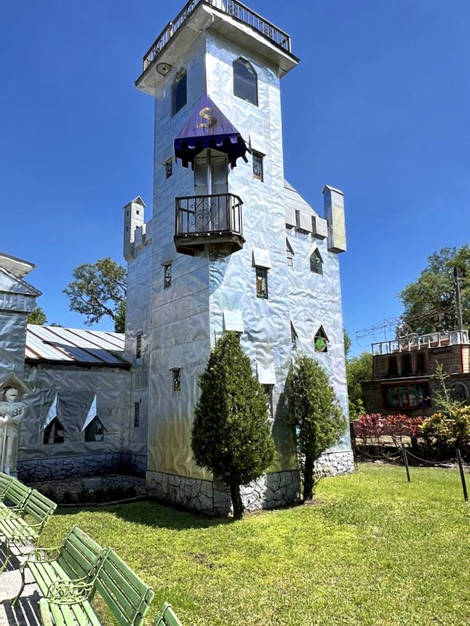 A medieval mirage in rural Florida! This aluminum-clad castle tower rises unexpectedly from the countryside like a knight's fever dream.