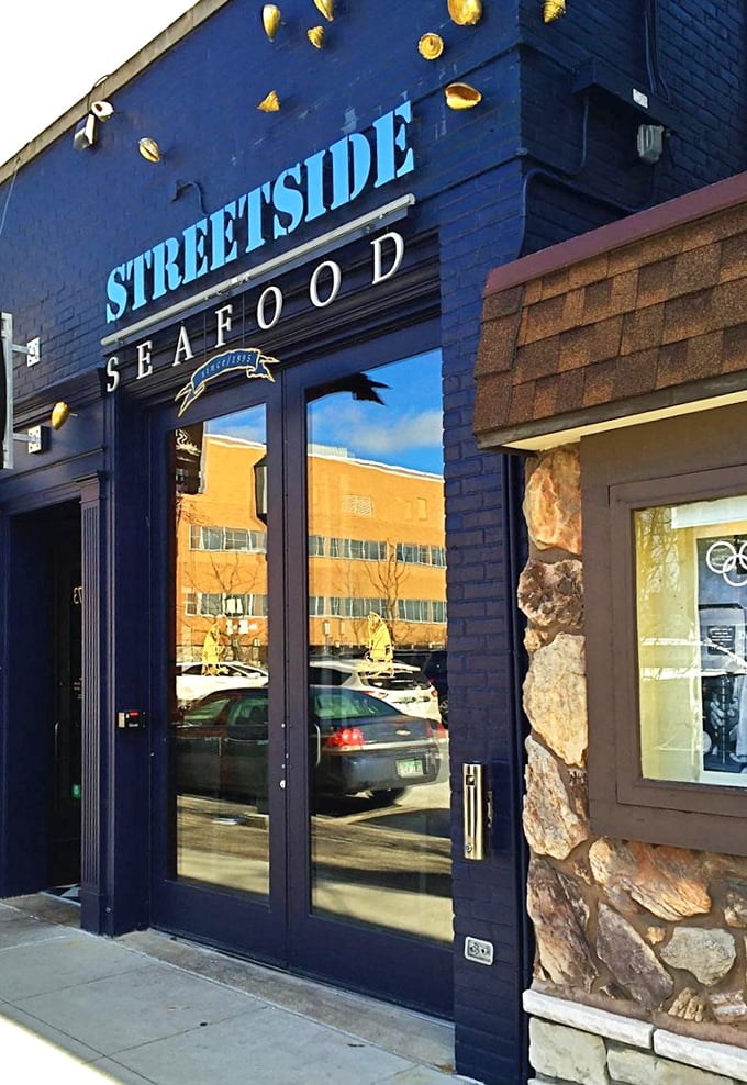Blue walls adorned with golden shells&mdash;Streetside Seafood wears its maritime heart on its sleeve. Birmingham's tiny seafood treasure!