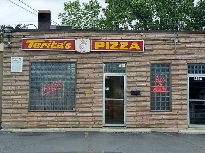 Terita's Pizza: The vintage sign and glass block windows are like a time machine to when pizza was simple and simply perfect.