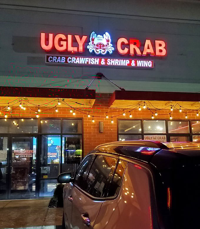 Evening lights make Ugly Crab's signage pop against the night sky. There's nothing ugly about those perfectly seasoned seafood boils waiting inside!