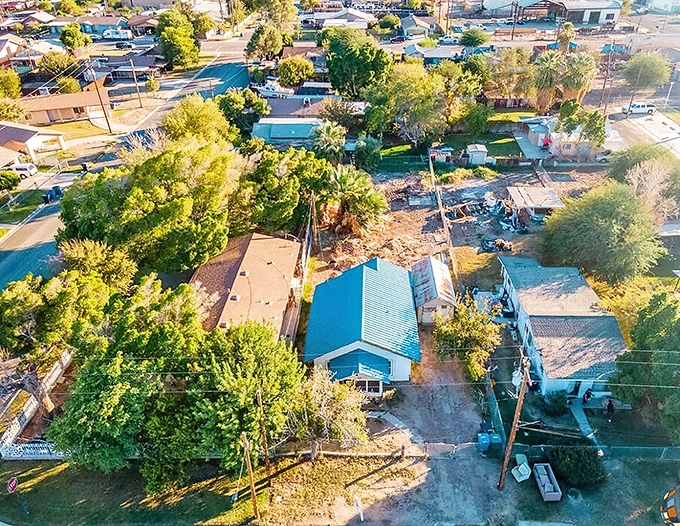 Aerial view of Westmorland reveals its patchwork of homes and green spaces. Desert living doesn't mean giving up on gardens!
