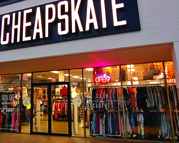 The glowing neon sign of the storefront beckons bargain hunters, promising the thrill of discovering hidden treasures inside.