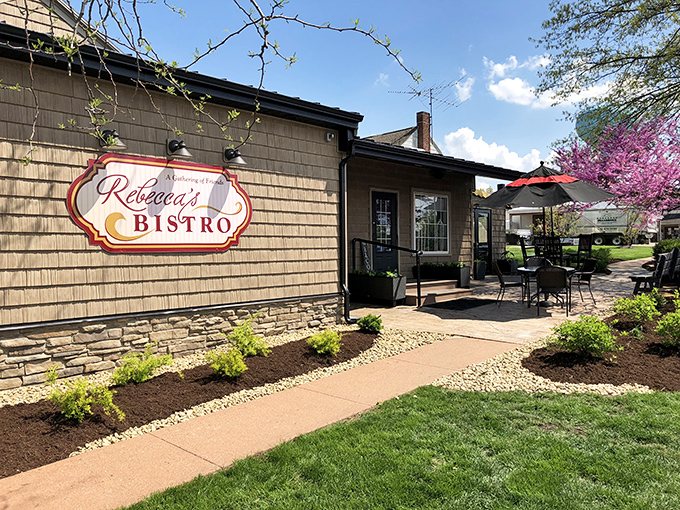 Rebecca's Bistro welcomes you with rustic charm and a splash of springtime color. The converted 1895 home promises culinary surprises behind that unassuming facade.