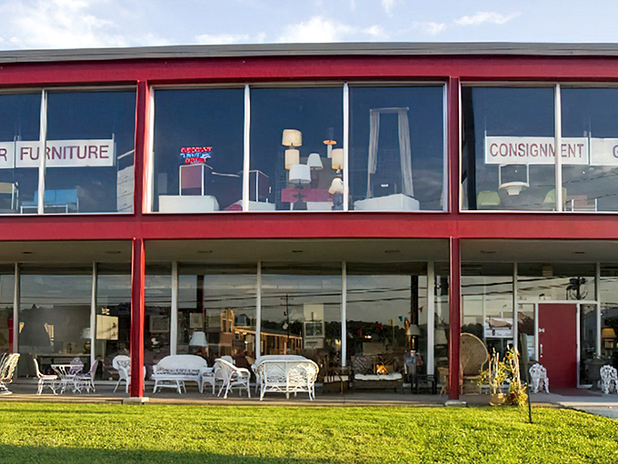 The crimson-trimmed building stands like a treasure chest waiting to be opened. Inside those windows? A furniture hunter's paradise.