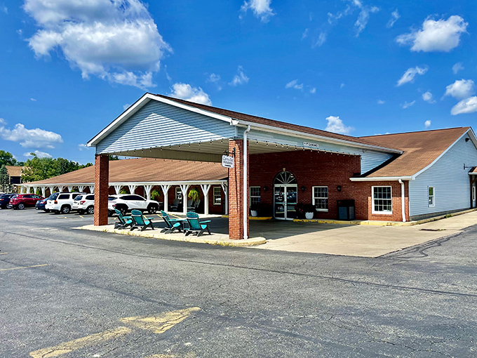 The welcoming exterior of Mary Yoder's promises comfort food salvation under Ohio's big blue sky. Those teal chairs are practically begging you to sit a spell.