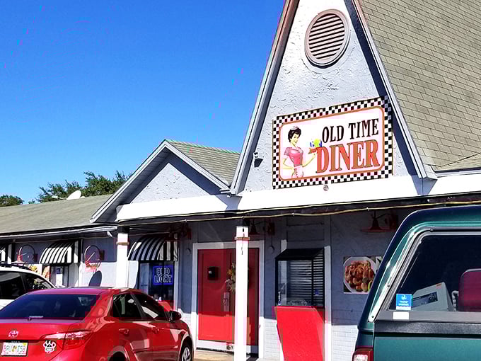 That iconic A-frame entrance isn't just architecture&mdash;it's a time machine disguised as a diner, complete with checkerboard trim that screams "Elvis might eat here."