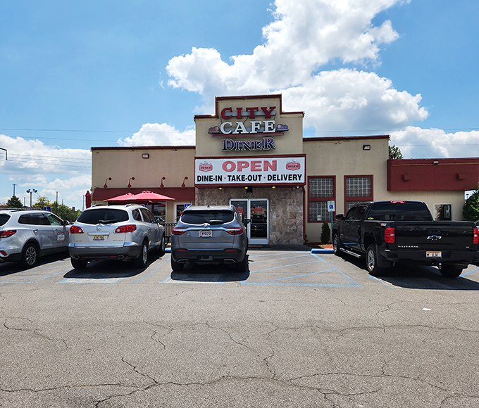 The unassuming exterior of City Cafe Diner stands like a beacon of breakfast hope on Huntsville's University Drive, promising comfort food salvation inside.