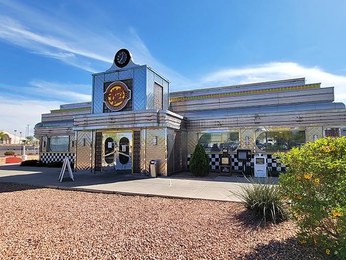 Shining like a chrome time machine under the Arizona sun, Nana Dee's exterior promises a journey back to when diners ruled American roadways.